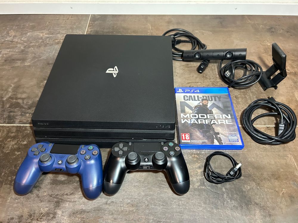 Ps4 Pro avec 2 manettes (D'occasion) à Les Cullayes pour CHF 125 ...