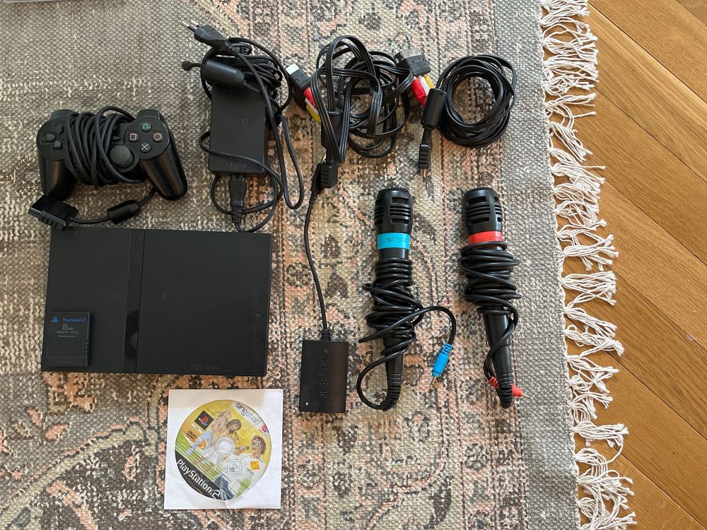 Playstation 2 pro inkl. Singstar & Microphones (Gebraucht) in Zürich ...