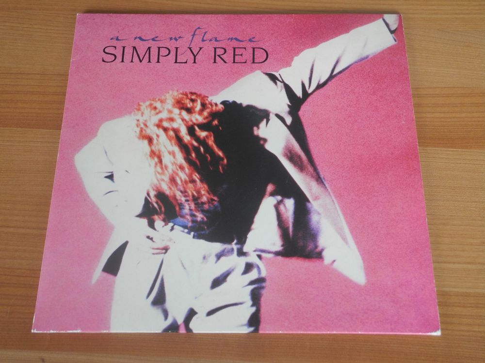 SIMPLY RED - A NEW FLAME - WEA (Neu (gemäss Beschreibung)) in ...