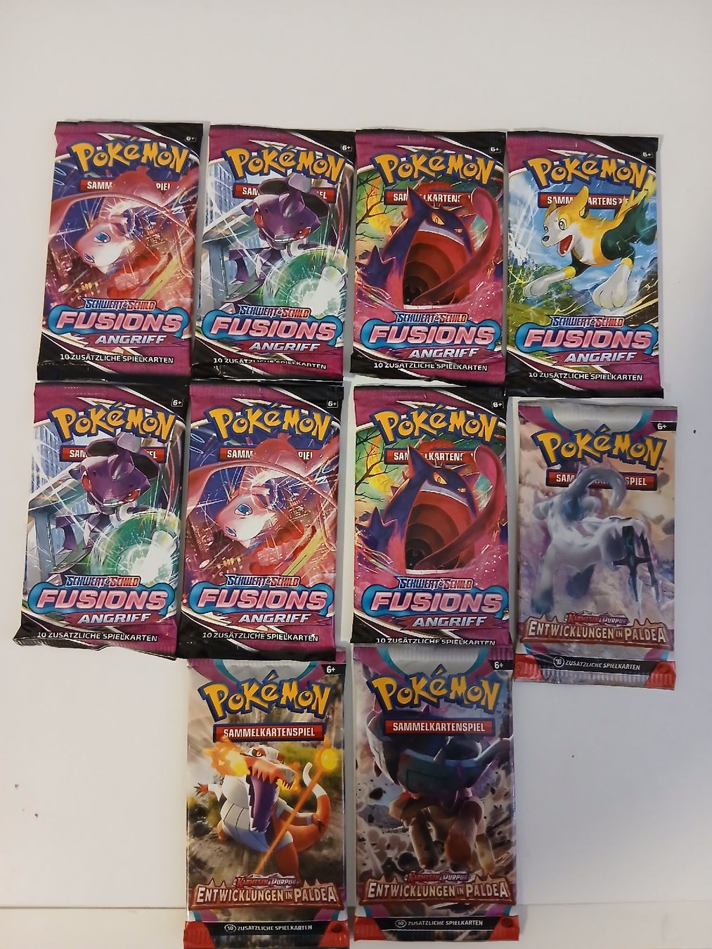 Carte pokemon 7x Fusions Strike &3x Evoluzioni a paldea DE (Neu und ...
