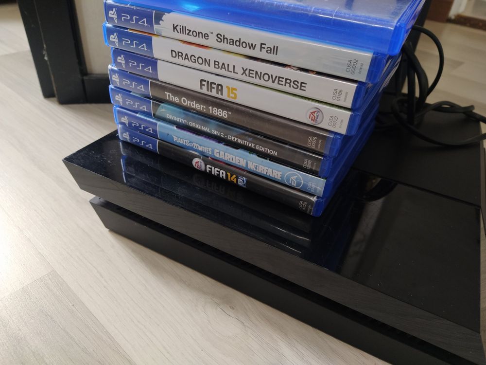 Console PS4 +8 jeux | Kaufen auf Ricardo