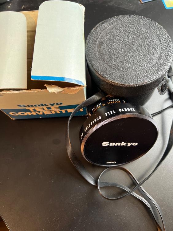 1 télé Converter x1.5 SANKYO selon photo (D'occasion) à Charmey (Gruyère) pour CHF 10 – avec ...