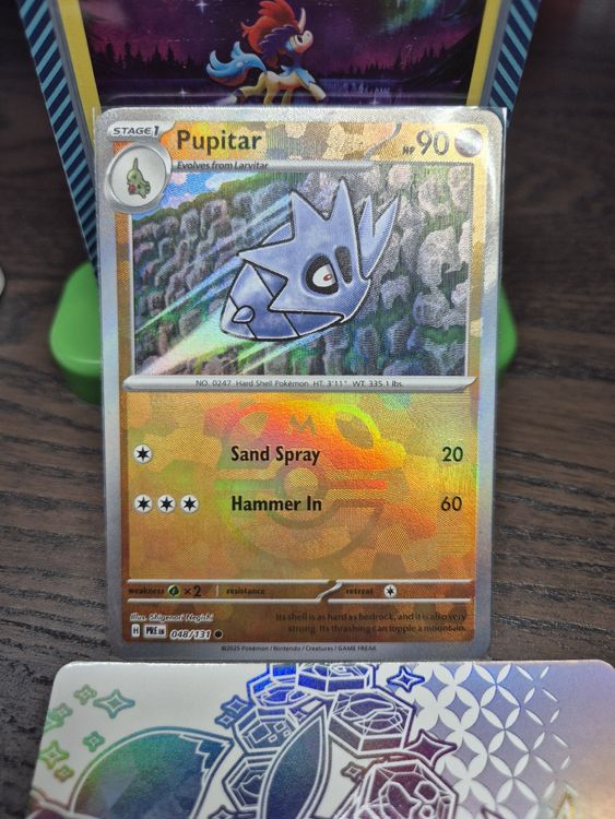 Pupitar Masterball 048/131 EN Prismatic Evolutions (Neu (gemäss ...