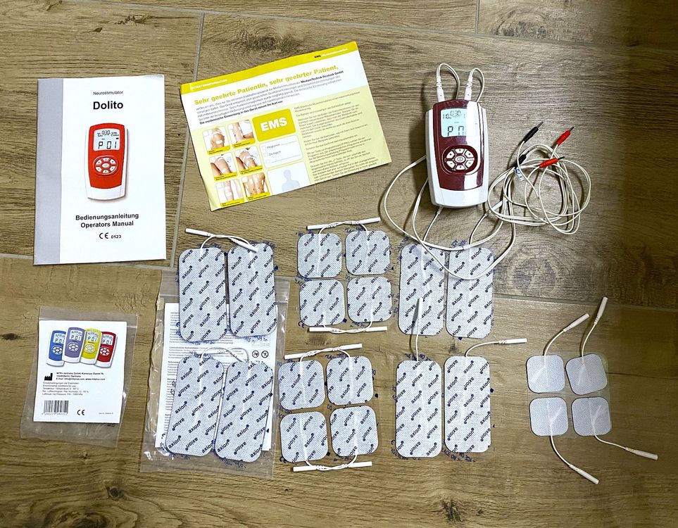 DOLITO-Neurostimulator Set TENS Gerät Reizstrom Muskelstimu (Gebraucht ...