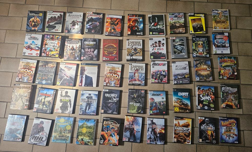PC Dvd / CD ROM 50 jeux !! (Gebraucht) in Etoy für CHF 80 – mit ...