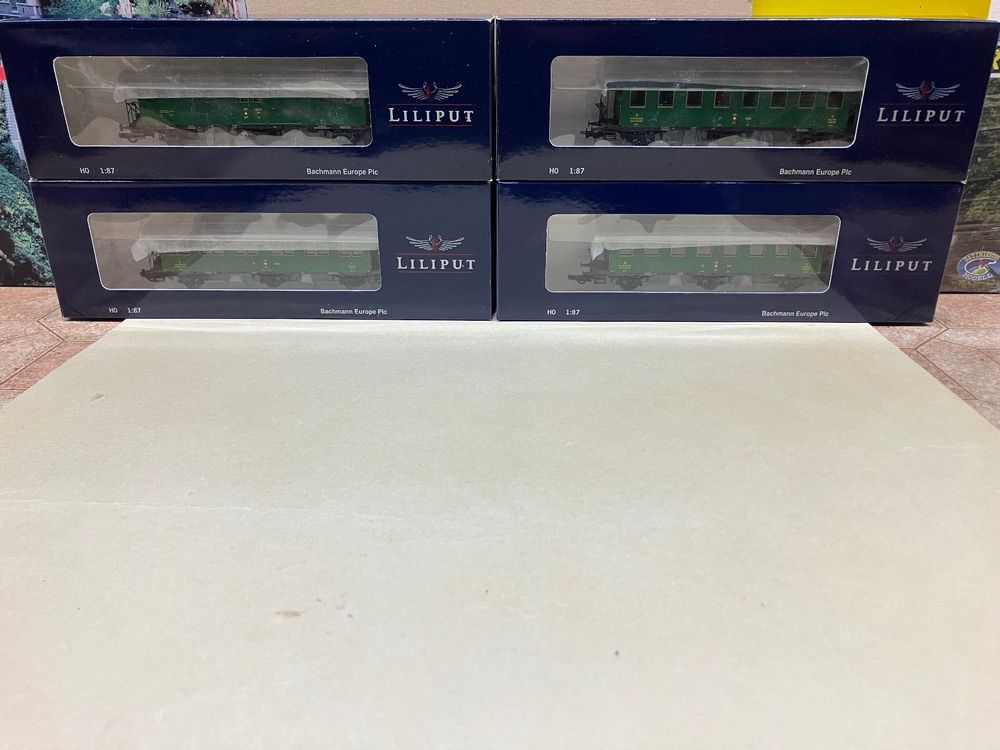 Liliput 4 Oldtimer Personenwagen 3-achsig der SBB-CFF, H0 GS (Gebraucht) in Neuendorf für CHF 92 ...