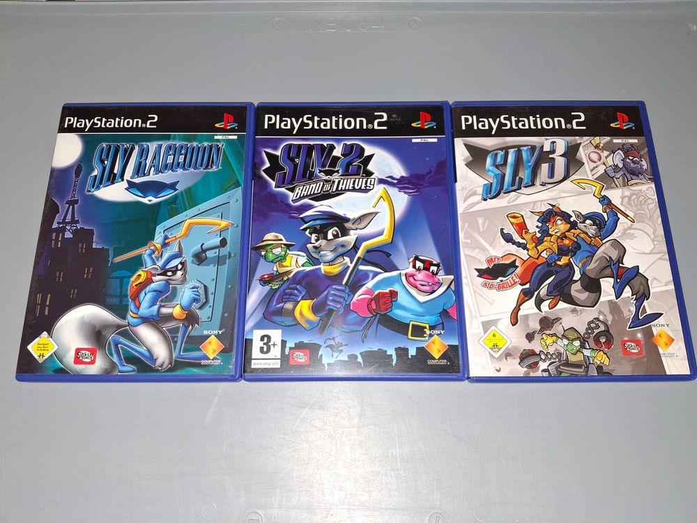 Sly Raccoon Sammlung: Sly 1 + 2 Band of Thieves + 3 - PS2 (Gebraucht ...