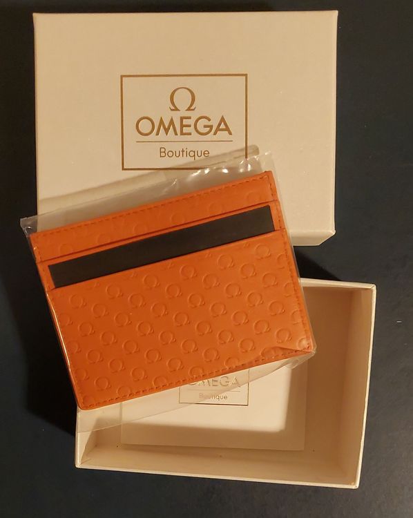 New Orange Omega Card Holder (Gebraucht) in Grandvaux für CHF 49 – mit ...