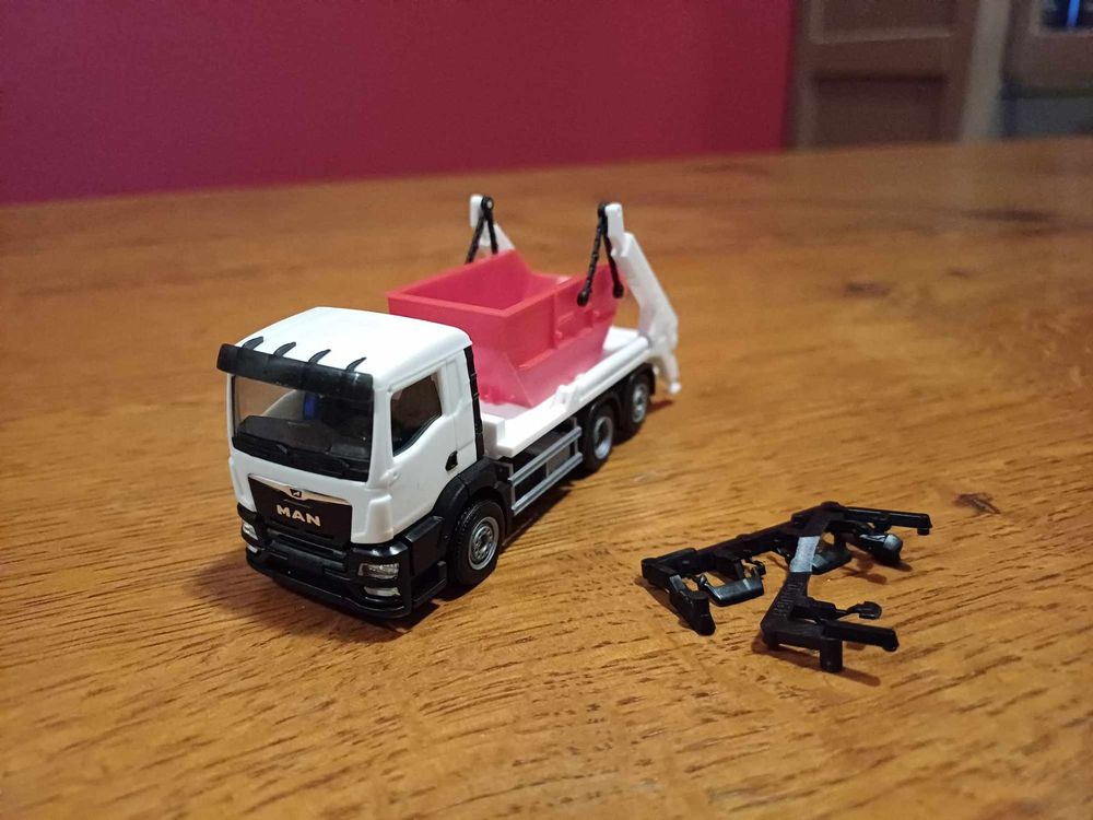 Herpa MAN Welaki Absetzkipper mit Mulde 1:87 (Neu (gemäss Beschreibung ...
