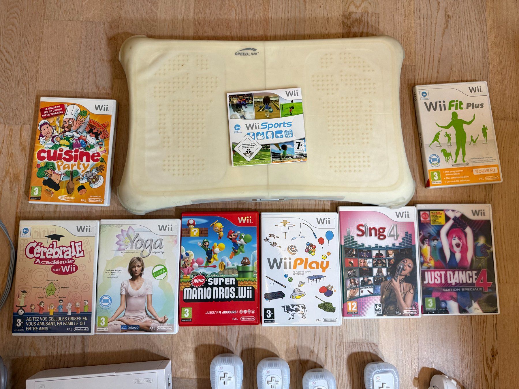 Wii console, 9 jeux, balance board, 2 micro et 4 manettes (D'occasion ...