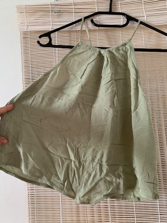 Petit top vert olive (Neu und originalverpackt) in Montreux für CHF 8 ...