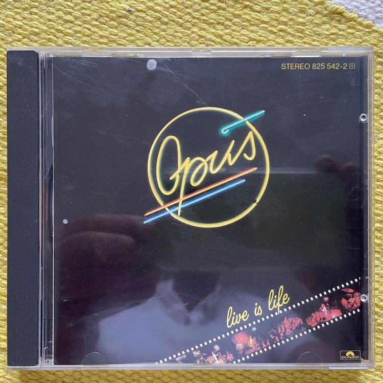 OPUS-LIVE IS LIVE (Gebraucht) in für CHF 2.9 – mit Lieferung auf Ricardo kaufen