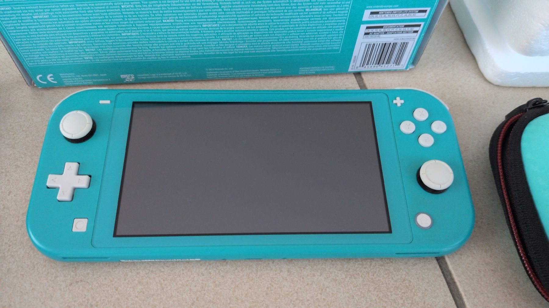 Nintendo Switch Lite (D'occasion) à Bottens pour CHF 92 – avec ...