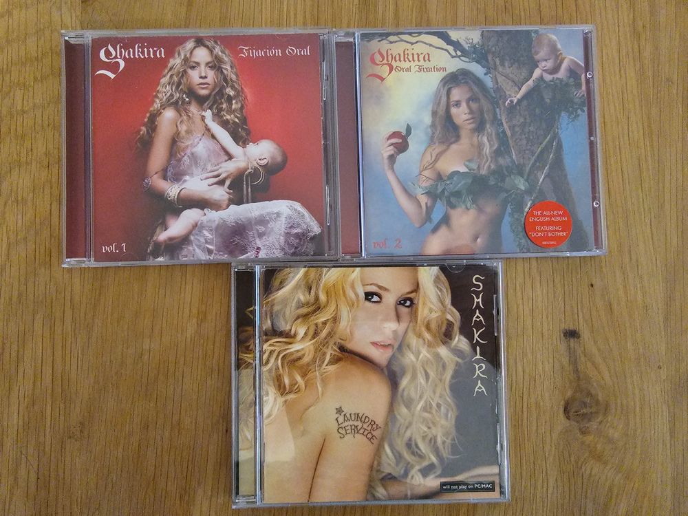 CDs - 3x Shakira, Laundry Service & Oral Fixation Vol. 1 & 2 (Gebraucht) in Biberist für CHF 2 ...