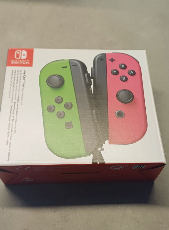 Nintendo Switch Controller Griffhalter (neon"grün"/rosa) (Neu und originalverpackt) in Zürich ...