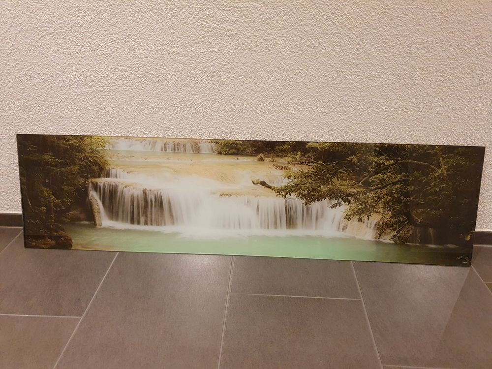 Glasbild mit Wasserfallmotiv (115cm x 30cm) (Gebraucht) in Schübelbach für CHF 20 – nur Abholung ...