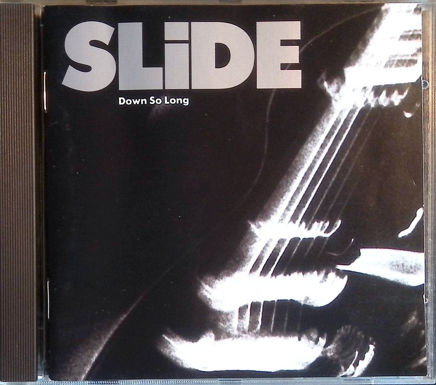 Slide – Down So Long (Gebraucht) in Russo für CHF 5 – mit Lieferung auf ...