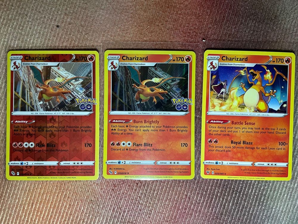 Charizard Bundle Holo & Reverse (Gebraucht) in für CHF 5.9 – mit ...