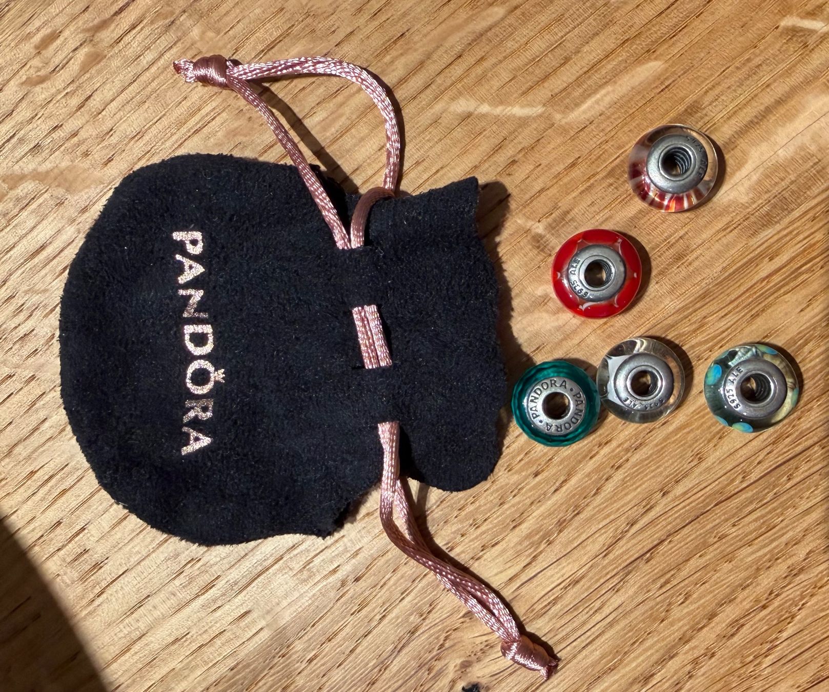 5x Pandora Charms Glas / Silber (Gebraucht) in Olten für CHF 25 – mit ...