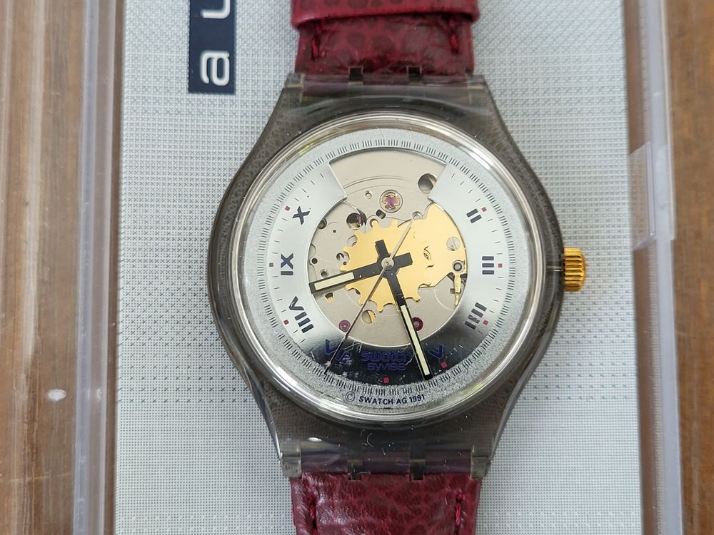 SWATCH AUTOMATIC SAM100 RUBIN VARIANTE NEU (Neu und originalverpackt) in Lommiswil für CHF 55 ...