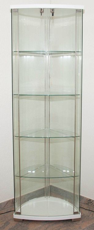 Stilvolle Eckvitrine Aus Glas Fotos