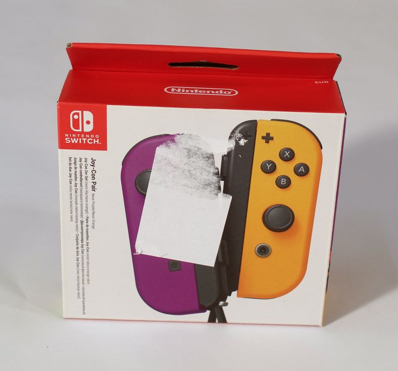 Nintendo Switch Joy-Con Pair Lilia Orange mit OVP NEU (Neu und originalverpackt) in Zürich für ...