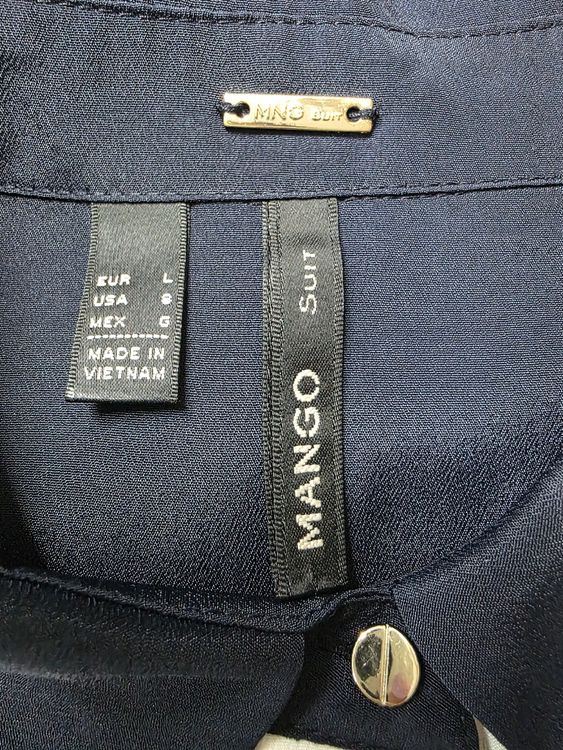 Le chemisier bi-color de chez Mango (Neuf avec emballage d'origine) à ...