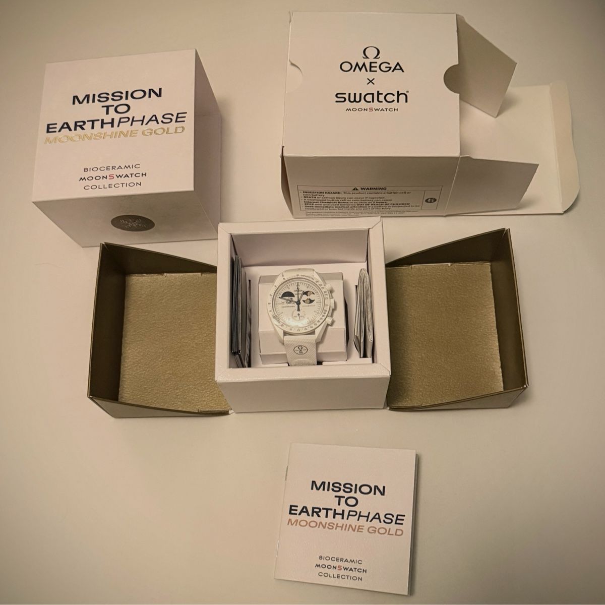 Omega MoonSwatch Mission to Earthphase Moonshine Gold (Neu und ...