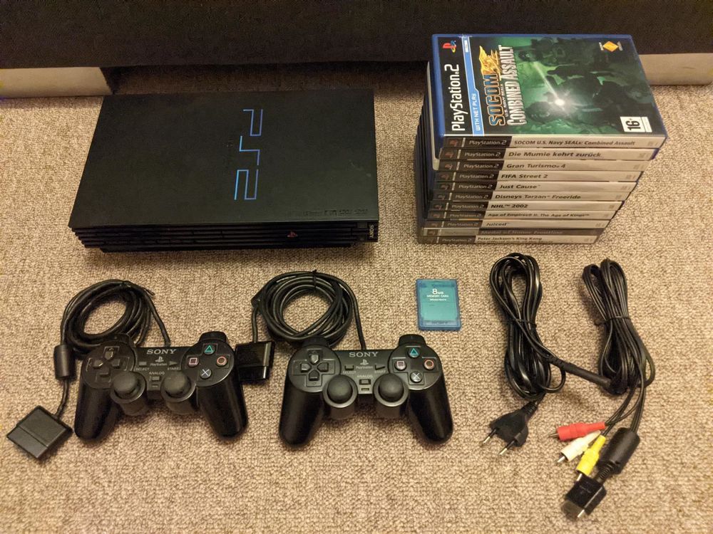 PlayStation 2, 2 Controller, 11 Games | Kaufen auf Ricardo