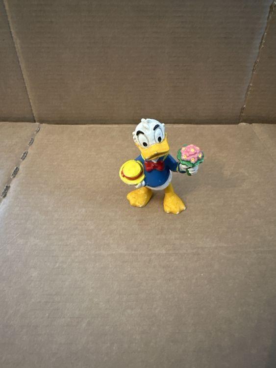 Donald Duck Figur mit Blume Bully, 1984 | Kaufen auf Ricardo