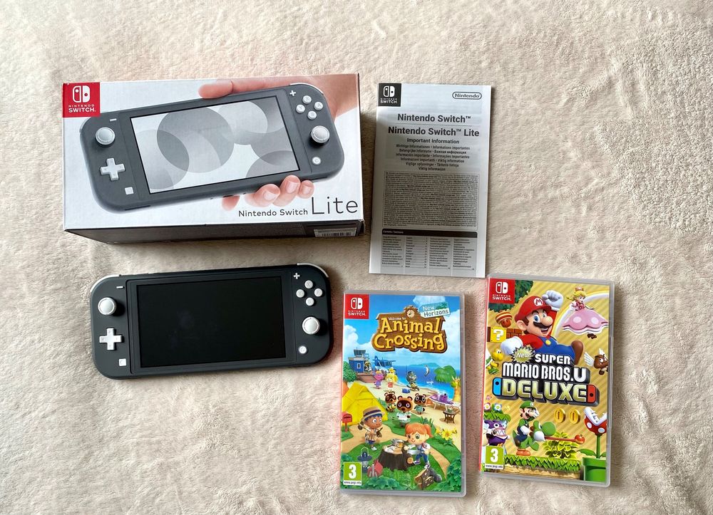 Nintendo Switch Lite mit 2 Games Super Mario Animal Crossing | Kaufen ...