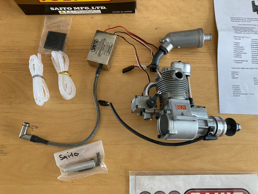 SAITO FG-21 4-Takt Benzin/Modellmotor mit Zündung (Gebraucht) in Zuzgen für CHF 365 – mit ...