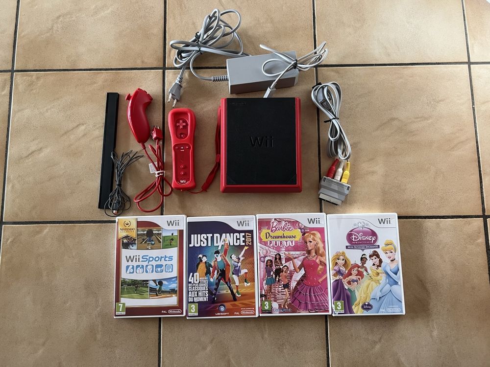 Nintendo Wii mini plus 4 jeux (Gebraucht) in St-Blaise für CHF 22 – mit ...