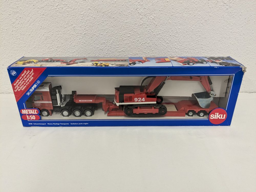 Siku Tieflader mit Bagger, Scania LKW 3930 OVP 1:50 (Gebraucht) in Weinfelden für CHF 61 – mit ...