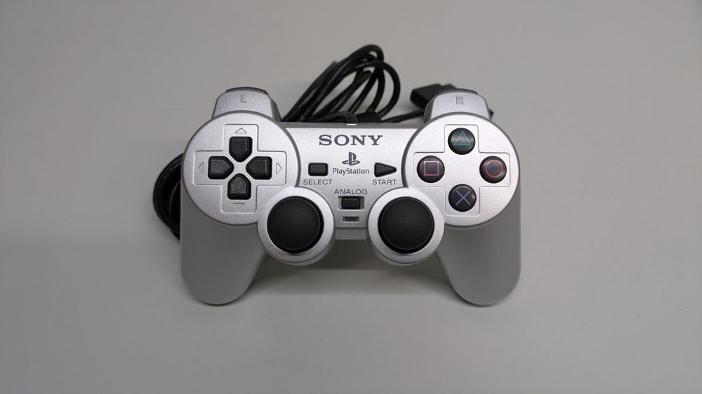 PlayStation 2 Slim Silver mit 2 Controller ORIGINAL (Gebraucht) in Menziken für CHF 145 – mit ...