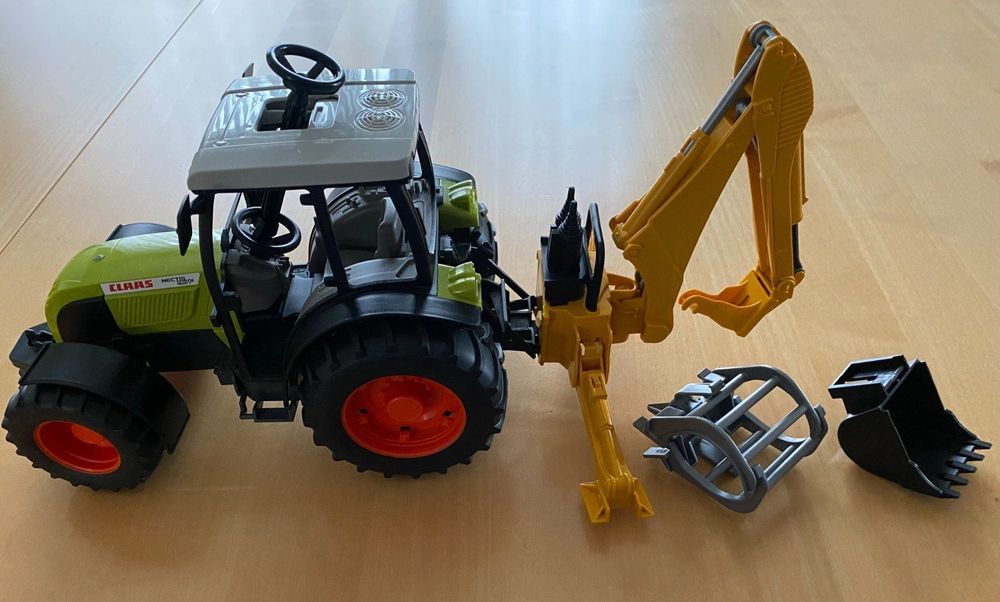 Bruder Traktor + Heckbagger mit Greifer | Kaufen auf Ricardo