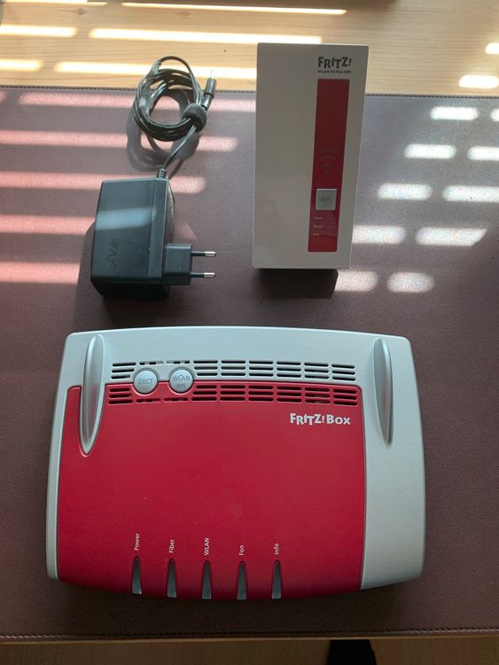 AVM FRITZ!Box 5490 Fiber + FRITZ!WLAN Repeater 1750E | Kaufen auf Ricardo