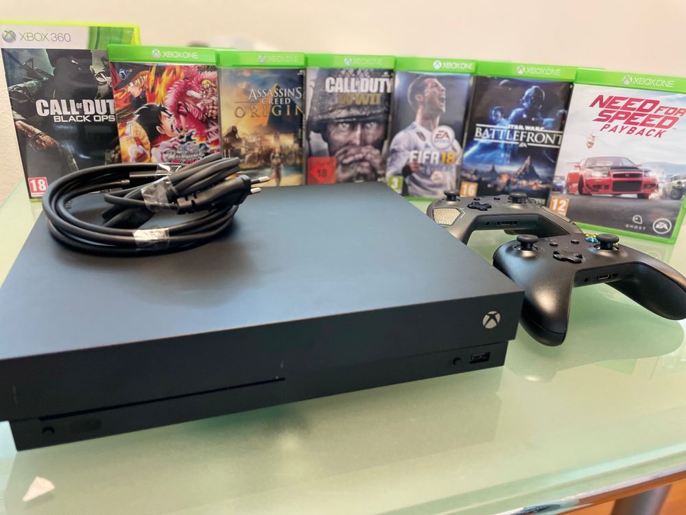 Microsoft Xbox One X 1TB Konsole + 2 Controlle + 7 Spiele (Gebraucht) in Büron für CHF 102 – mit ...