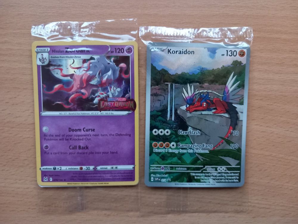 Lot de 2 cartes pokemon scellées Koraidon & Zoroark (Gebraucht) in ...