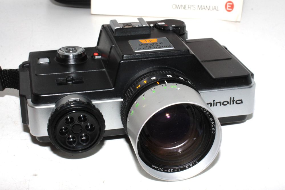 MINOLTA 110 ZOOM SLR + Etui + Anleitung (E) + Gummi-Sonnenbl (Gebraucht ...