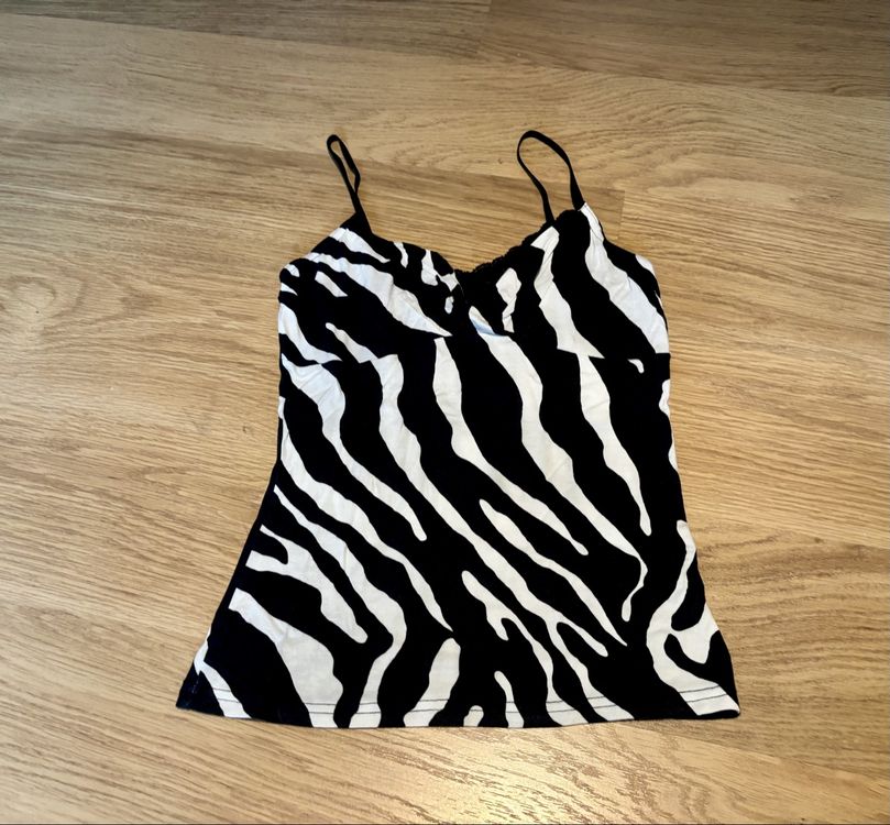 Zebra Top mit Spitze (Gebraucht) in Baden für CHF 6 – mit Lieferung auf ...