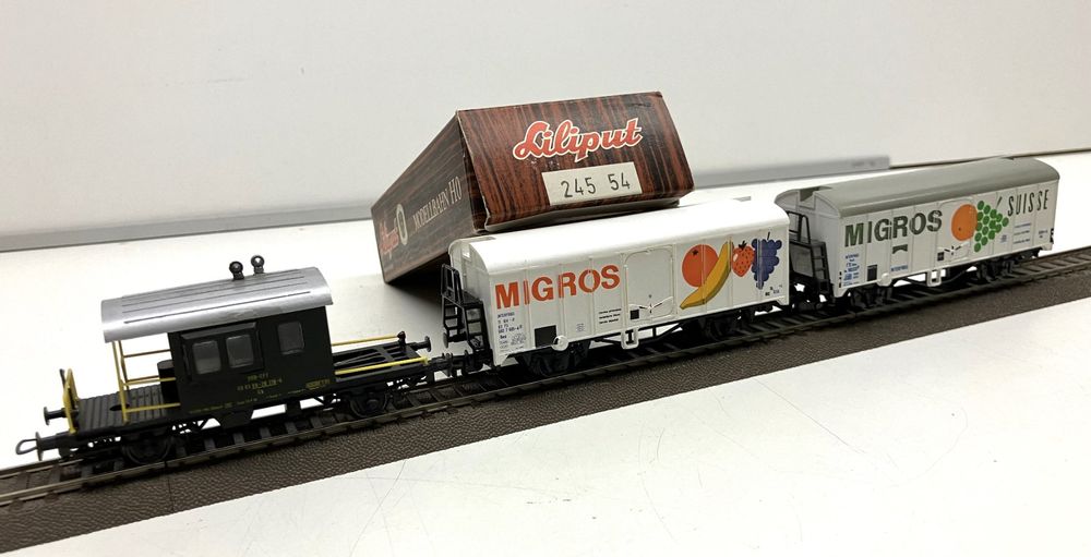 Liliput H0= 2x Güterwagen FS Migros - 1x Sputnik SBB Db (Gebraucht) in für CHF 18.9 – mit ...