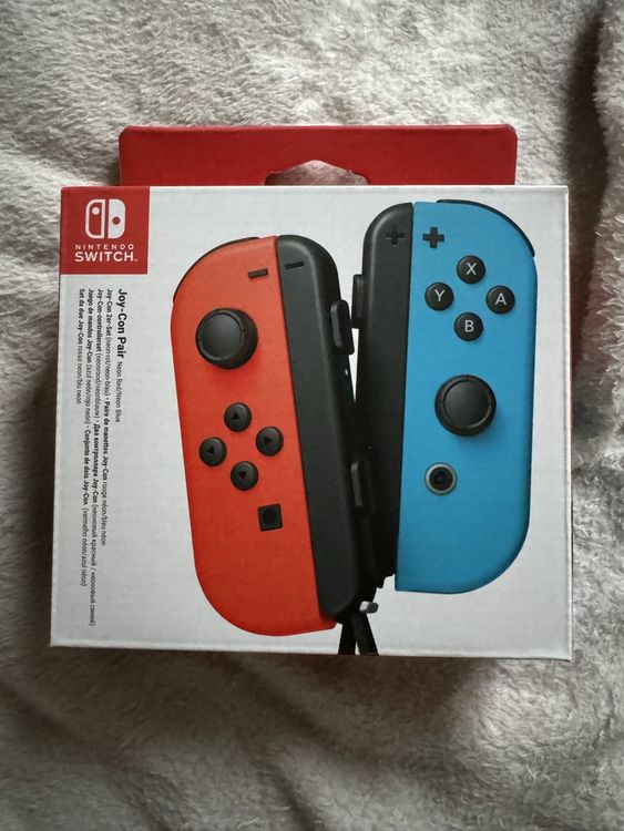 NEU Joy-Con Pair Neon Red / Neon Blue Nintendo Switch | Kaufen auf Ricardo
