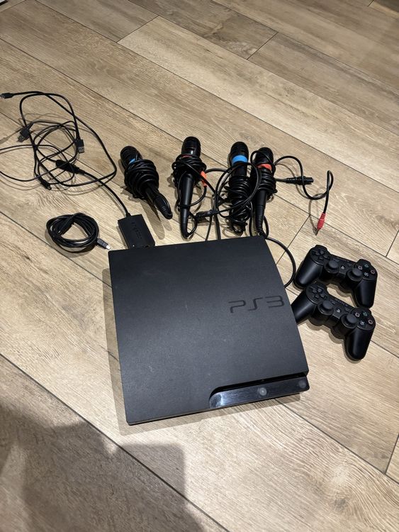 Playstation 3 (PS3) mit 2 Controller und 4 Mikros (Gebraucht) in ...