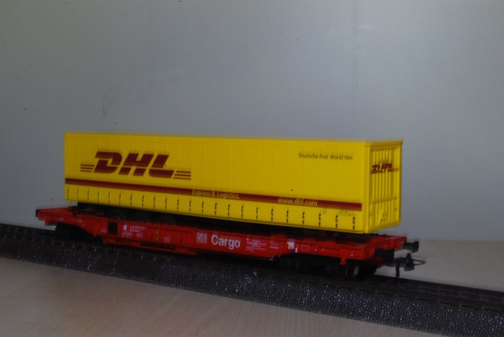 Roco DB Tragtaschenwagen mit DHL Auflieger | Acheter sur Ricardo