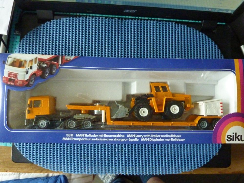 SIKU MAN TIEFLADER MIT BAUMASCHINE 3811 | Kaufen auf Ricardo